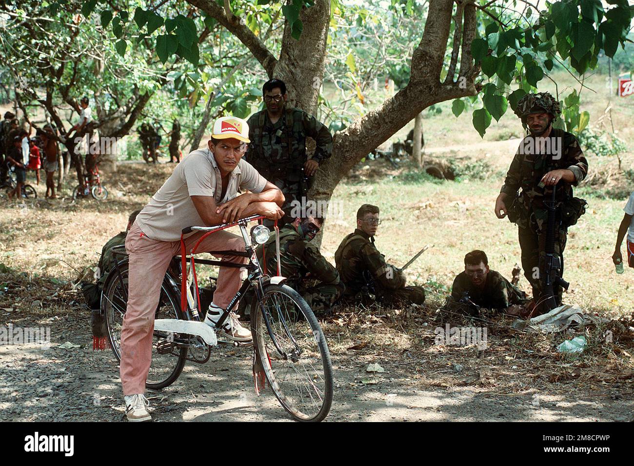 Panamanian citizens mingle with soldiers of the 7th Infantry Division ...