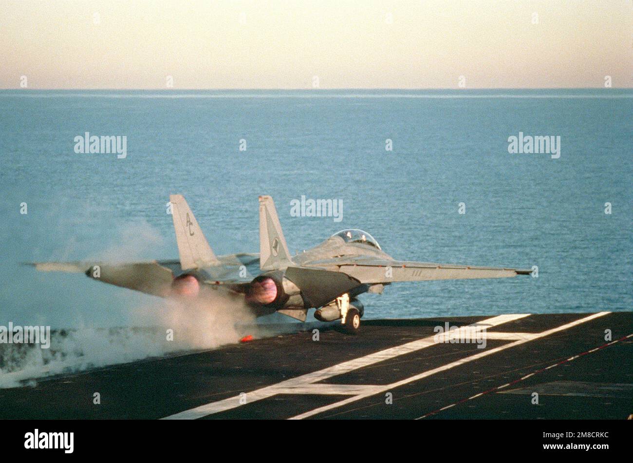 A Fighter Squadron 14 (VF-14) F-14A Tomcat aircraft is launched from ...