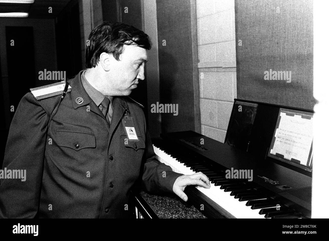 A member of a visiting Soviet military band inspects an electronic ...