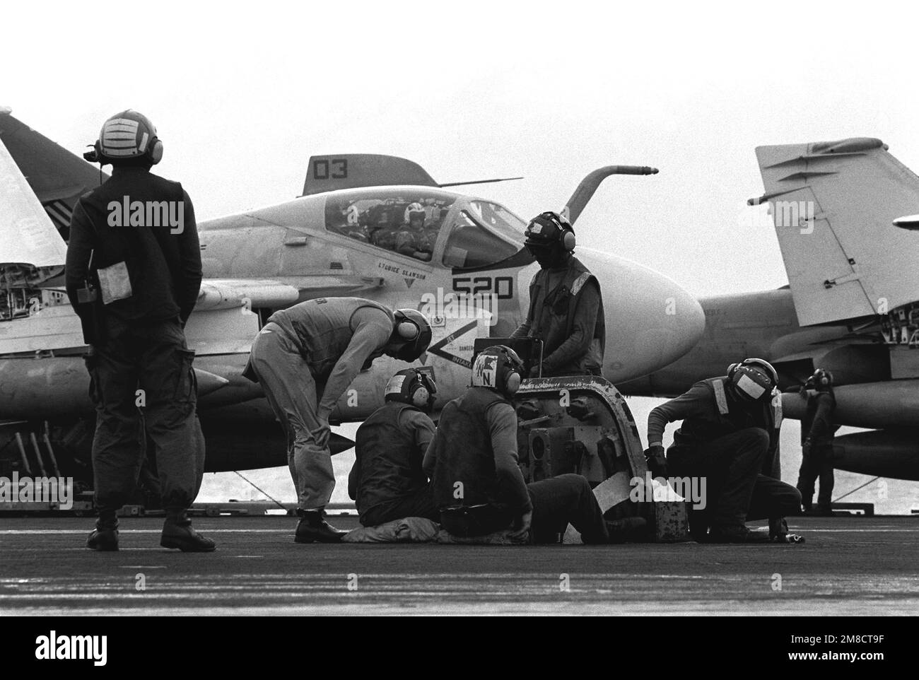 Sailors manning the bow catapult control station aboard the aircraft ...
