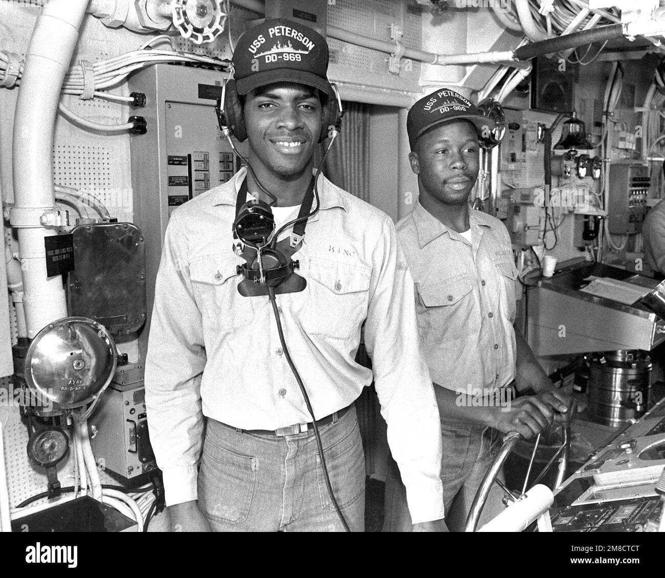 Operations SPECIALIST SEAMAN Henry King Jr., left, and SN Cedric M ...