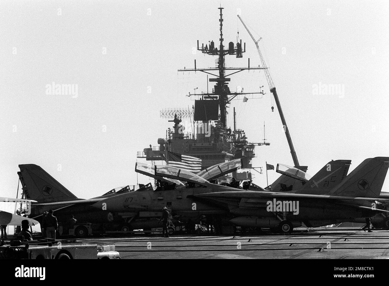 Plane captains of Fighter Squadron 14 (VF-14) and other squadrons check ...