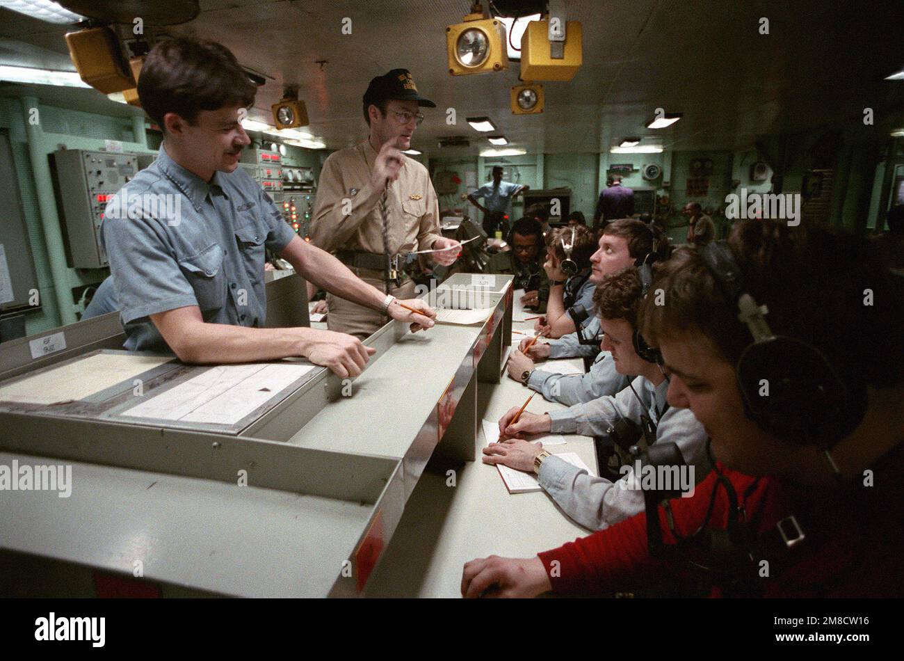 Lieutenant Steve Weingart, second from left, the damage control ...