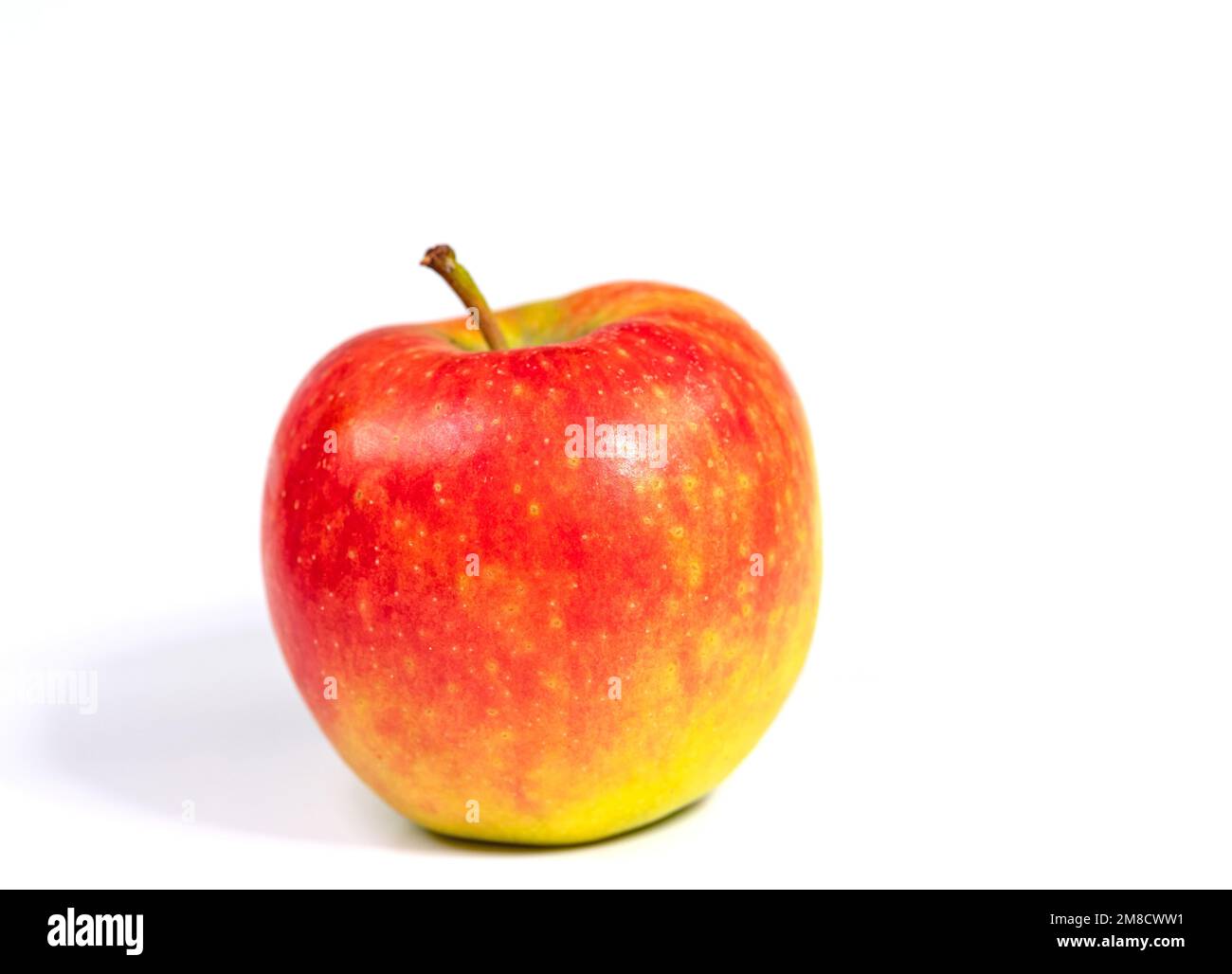 Apple isolated against white background Stock Photo - Alamy