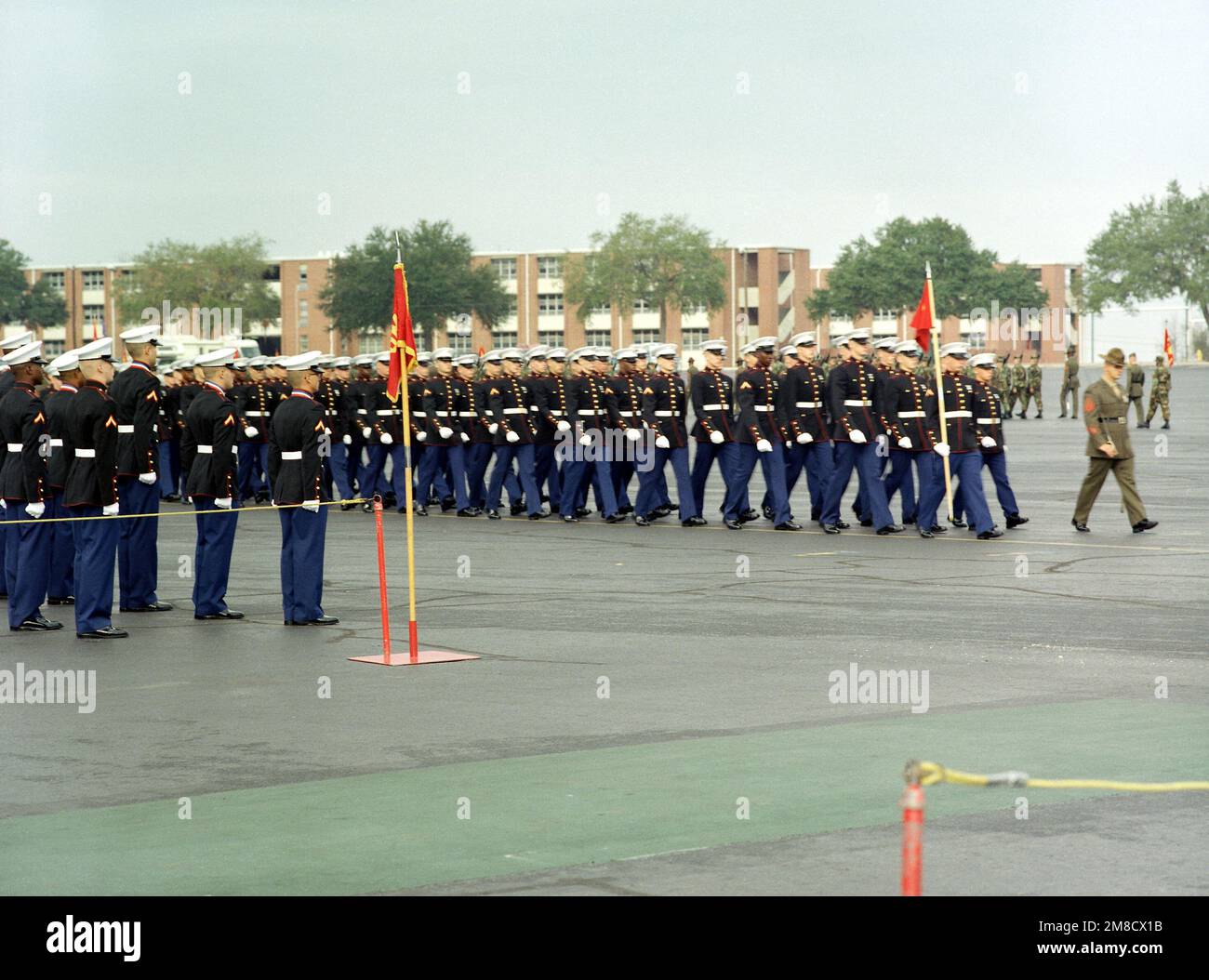 Members of a graduating platoon from Company A, 1ST Battalion march in ...