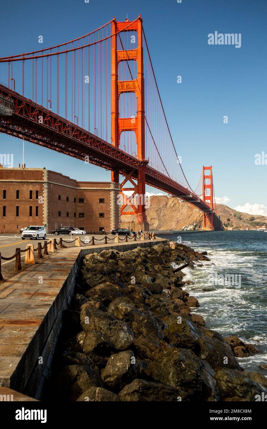 A vertical shot of the Golden Gate Bridge in San Francisco on a sunny ...