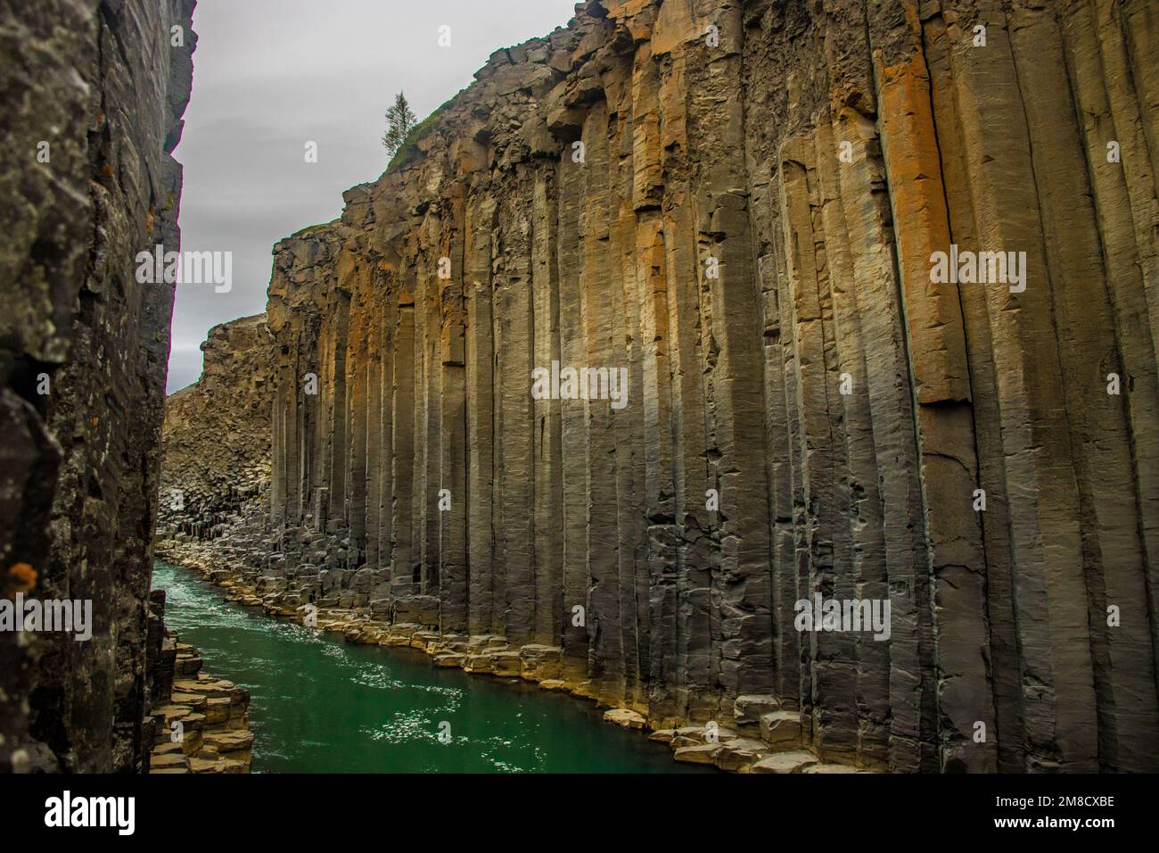 Studlafoss and Studlagil Basalt Rock Columns Canyon Dramatic Landscape river in Jokuldalur ...