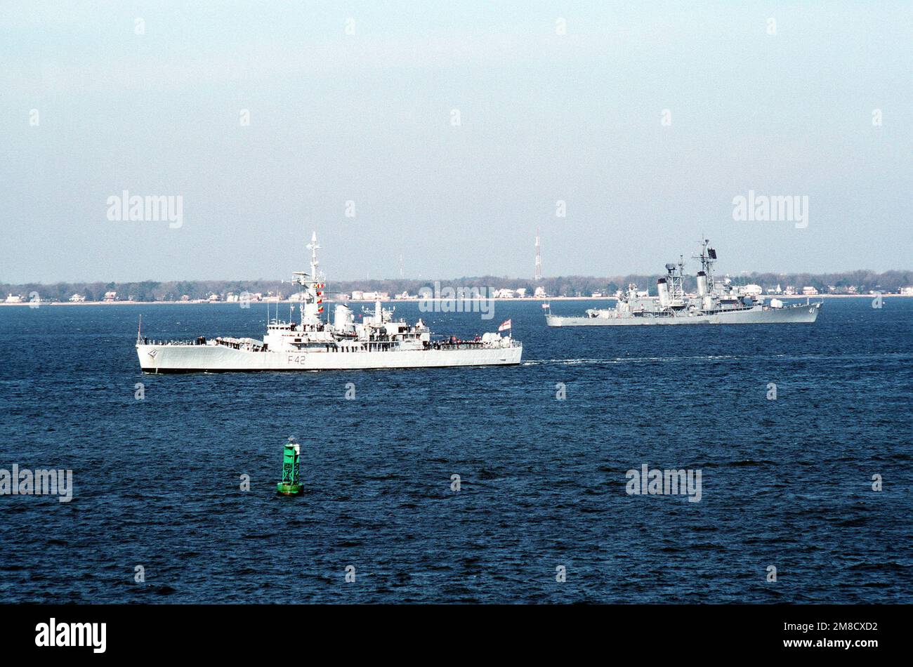 The British frigate HMS PHOEBE (F-42) passes the guided missile ...