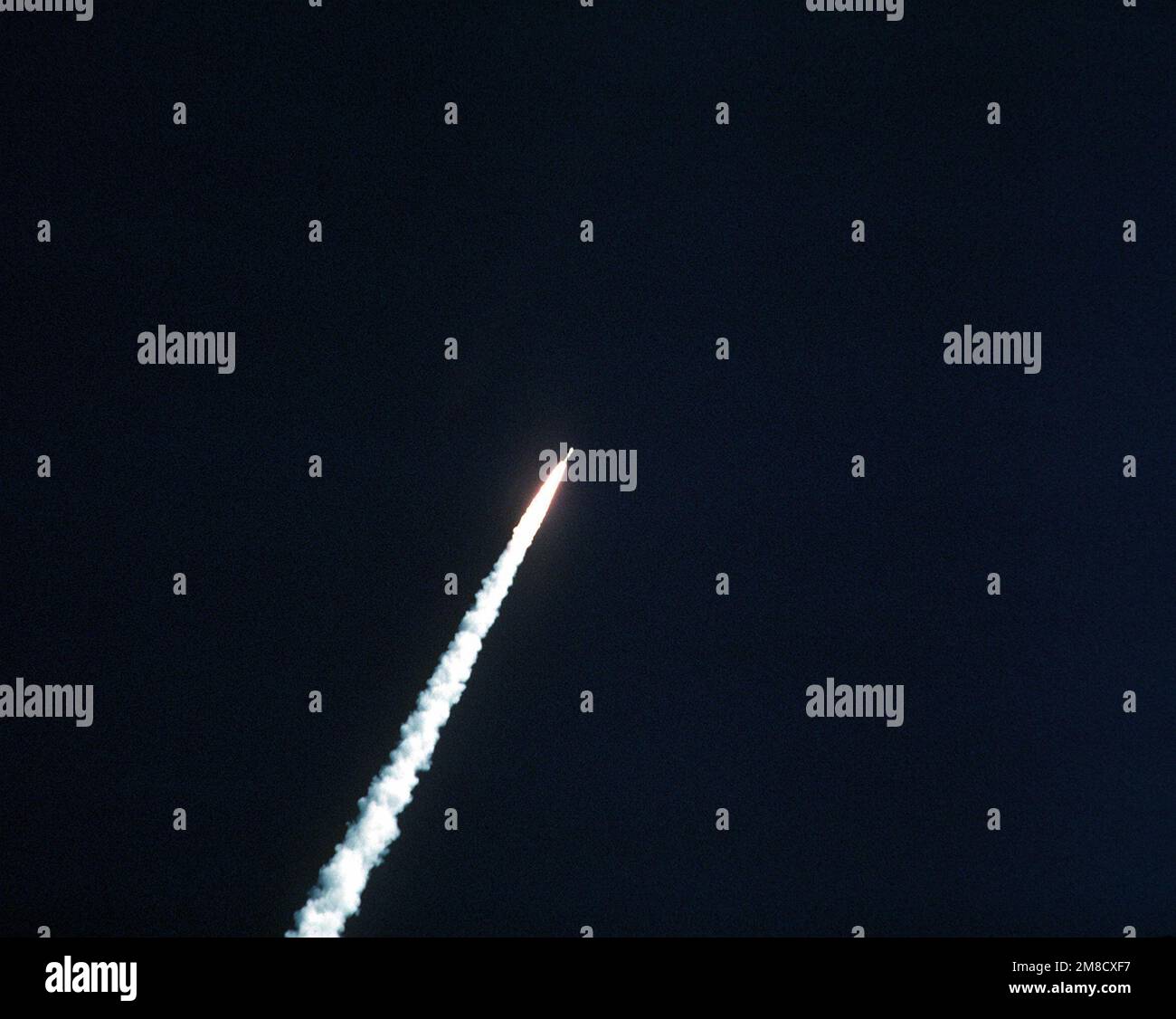 A D-5 Trident II submarine-launched ballistic missile is airborne ...