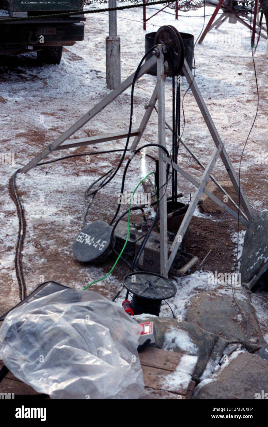 Surveillance equipment is positioned at a bore hole site near Kach'il ...