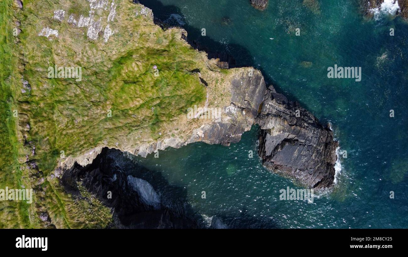 Grassy cliffs on the Atlantic Ocean coast. Landscape of Ireland from a ...