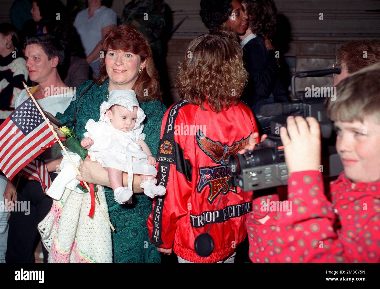 Friends and family members are on hand to welcome the soldiers of the ...