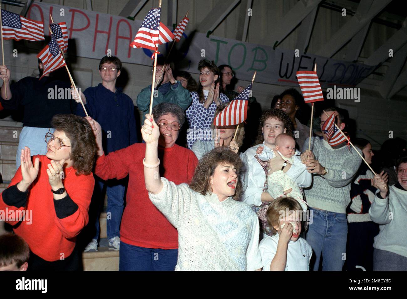 Friends and family members are on hand to welcome the soldiers of the ...