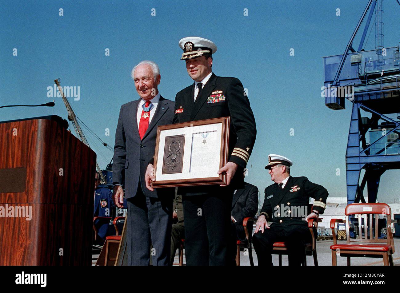 COL Mitchell Paige, USMC (Ret.), Medal of Honor recipient, presents a ...