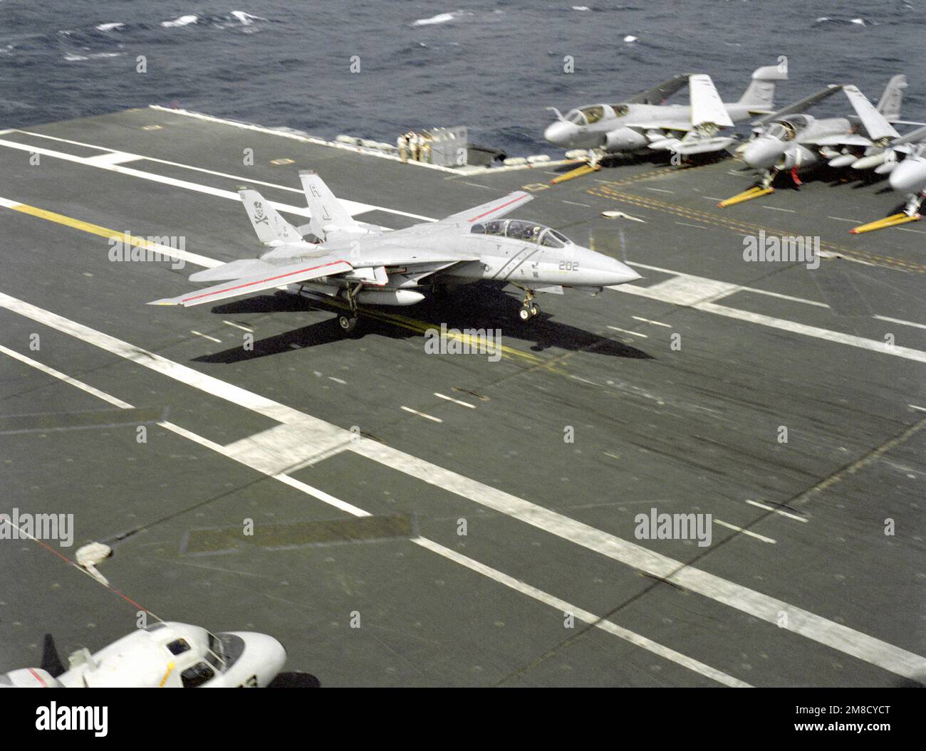 A Fighter Squadron 84 (VF-84) F-14A Tomcat aircraft catches the No. 1 ...