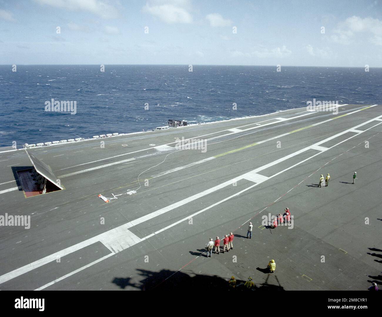 An aerial banner target sits on the flight deck of the nuclear-powered ...