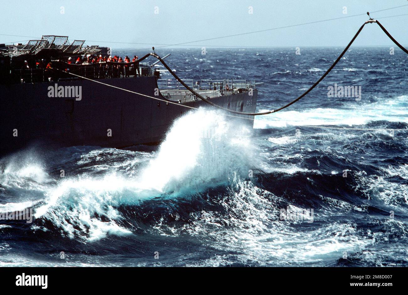 Members of the underway replenishment detail stand at their station ...