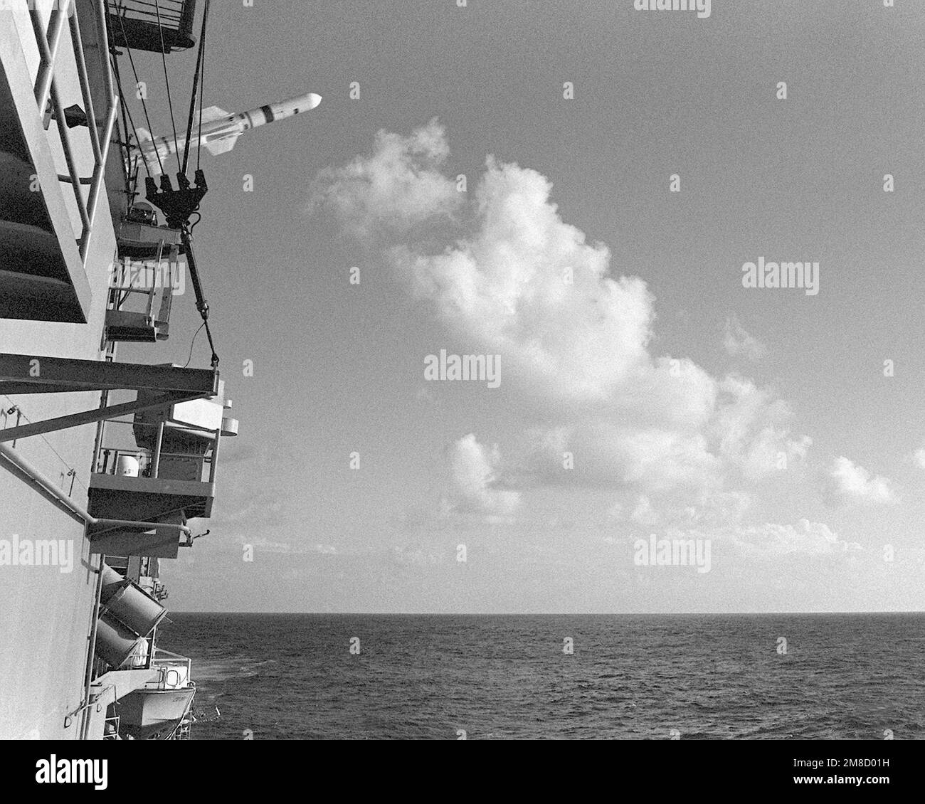 An RGM-84A Harpoon anti-ship missile is launched from the destroyer USS ...