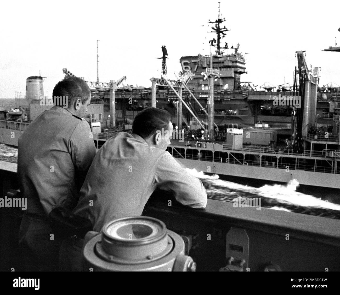 CMDR L. A. Lewandowski, commanding officer of the destroyer USS ...