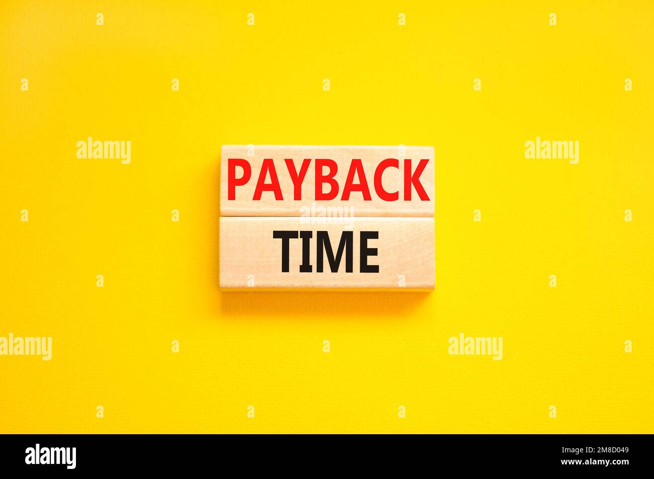 Payback time symbol. Concept words Payback time on wooden blocks ...