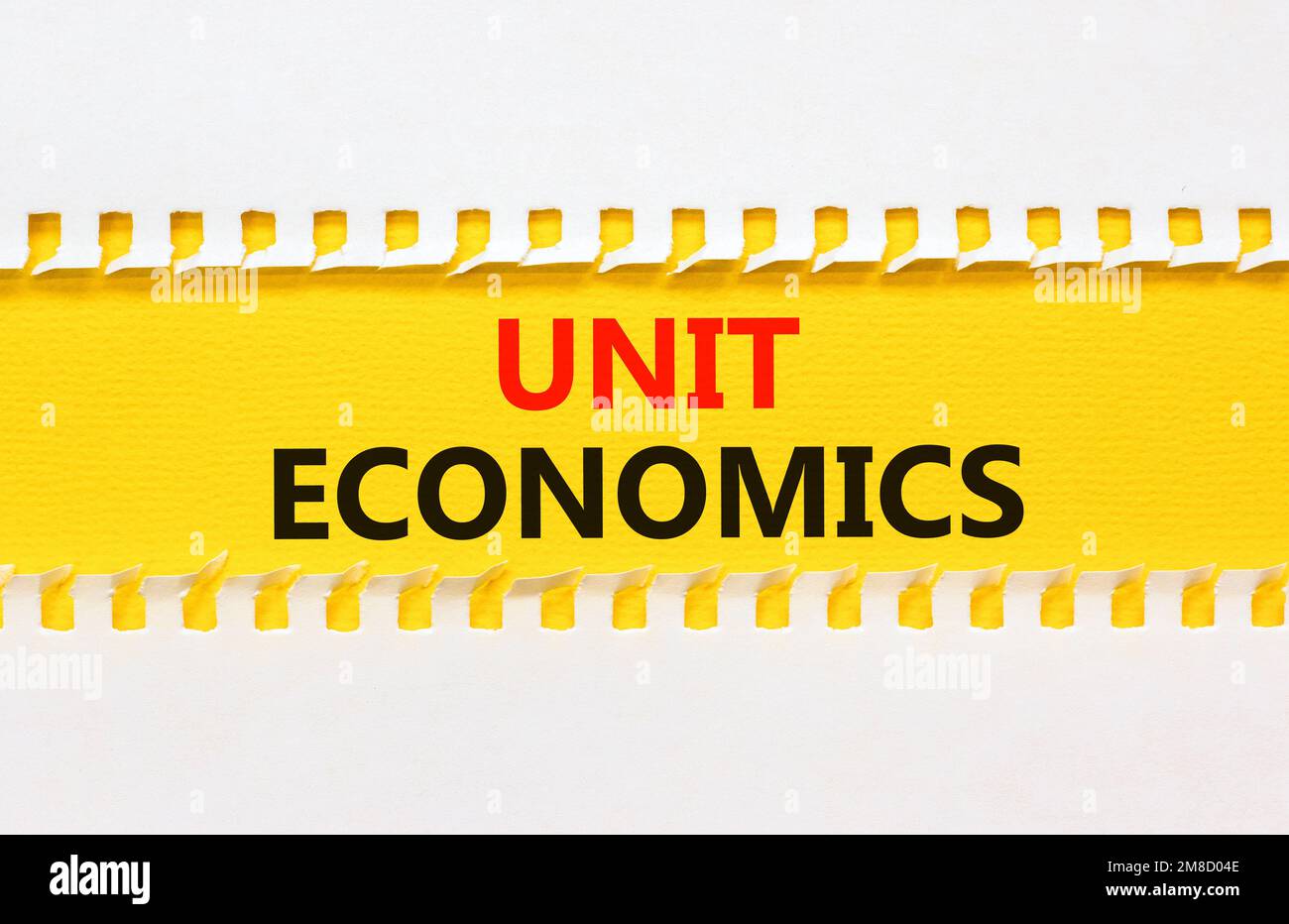 Unit Economics Symbol Concept Words Unit Economics On Yellow Paper