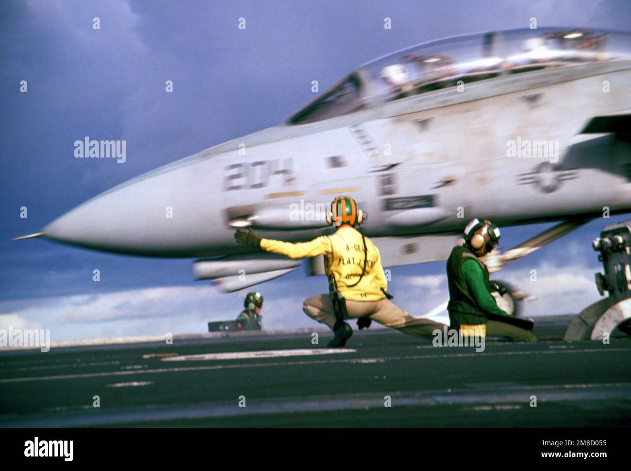 A Fighter Squadron 33 (VF-33) F-14A Tomcat aircraft is launched from ...