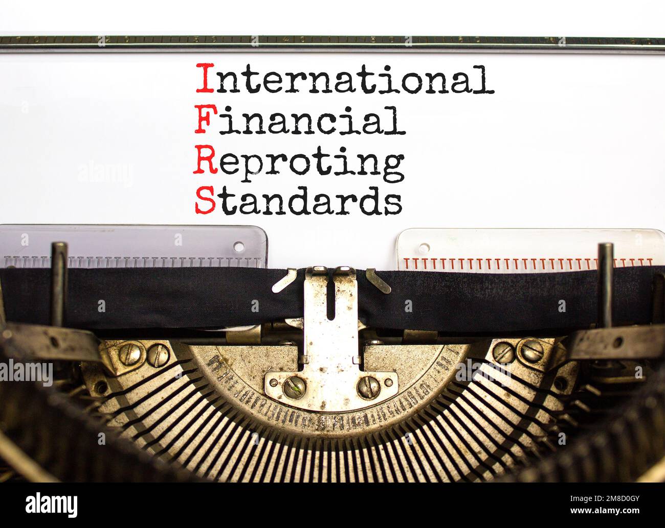 IFRS symbol. Concept words IFRS international financial reporting standards on typewriter on ...