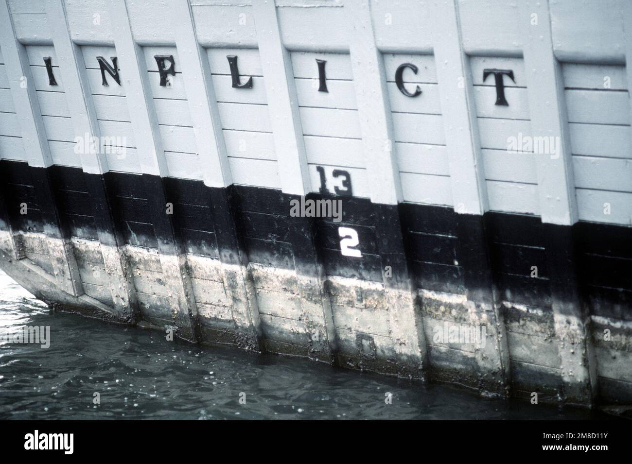 A close-up view of the stern of the minesweeper USS INFLICT (MSO-456 ...