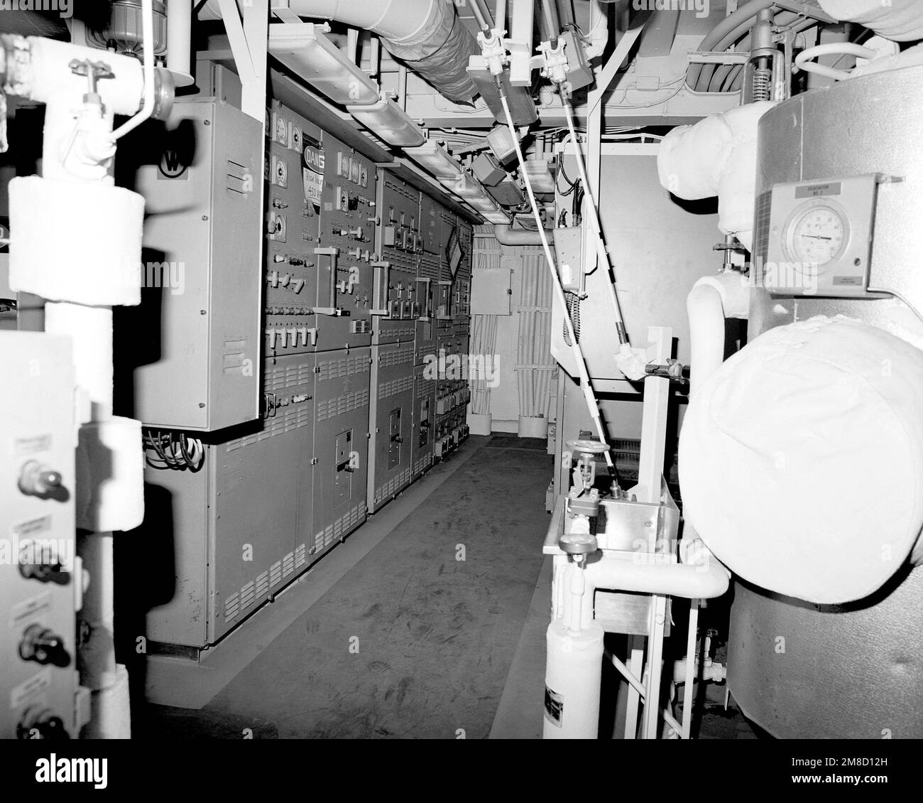 A view of main engine room No. 2 aboard the guided missile cruiser ...