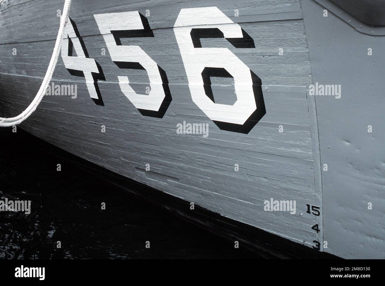 A close-up view of part of the bow of the minesweeper USS INFLICT (MSO ...