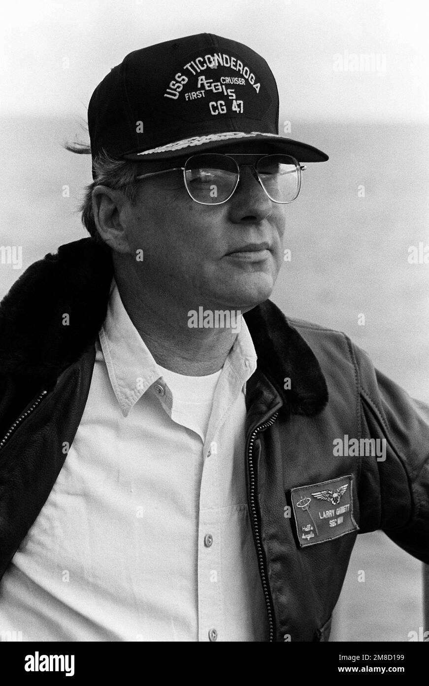 Secretary of the Navy H. Lawrence Garrett III relaxes while visiting ...