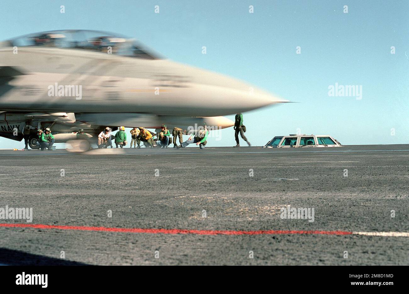 A Fighter Squadron 84 (VF-84) F-14A Tomcat aircraft is launched from ...