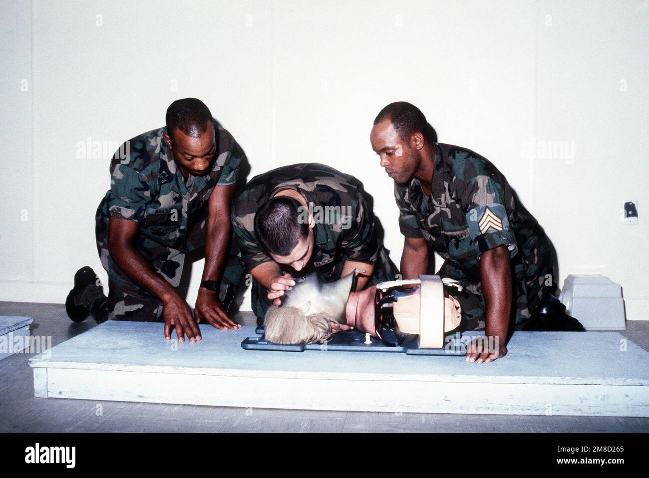 An instructor works with recruits practicing cardio-pulmonary ...