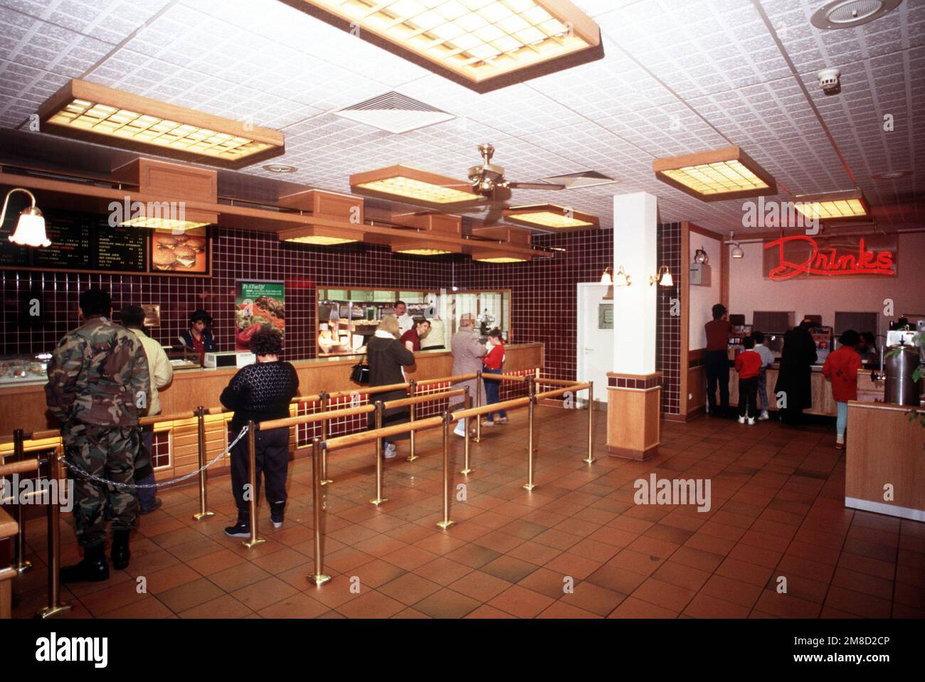 Customers visit fast food concessions at the Army/Air Force Exchange ...