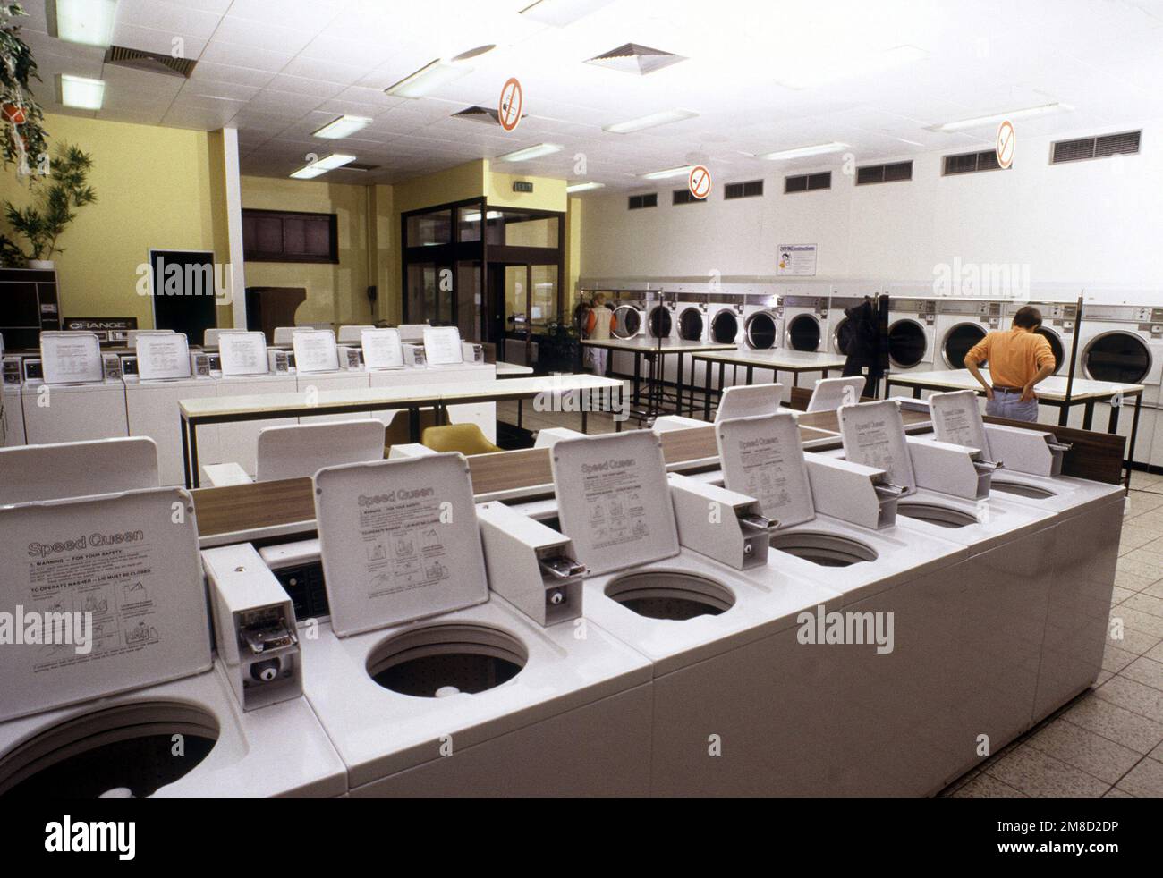 Customers use the Truman Plaza laundry, an Army/Air Force Exchange ...