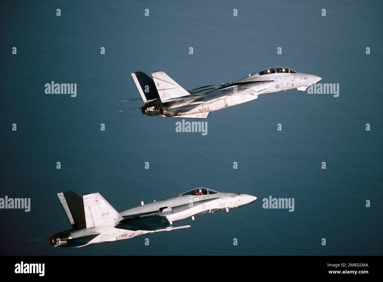 An air-to-air right side view of a Canadian 416th Tactical Fighter ...