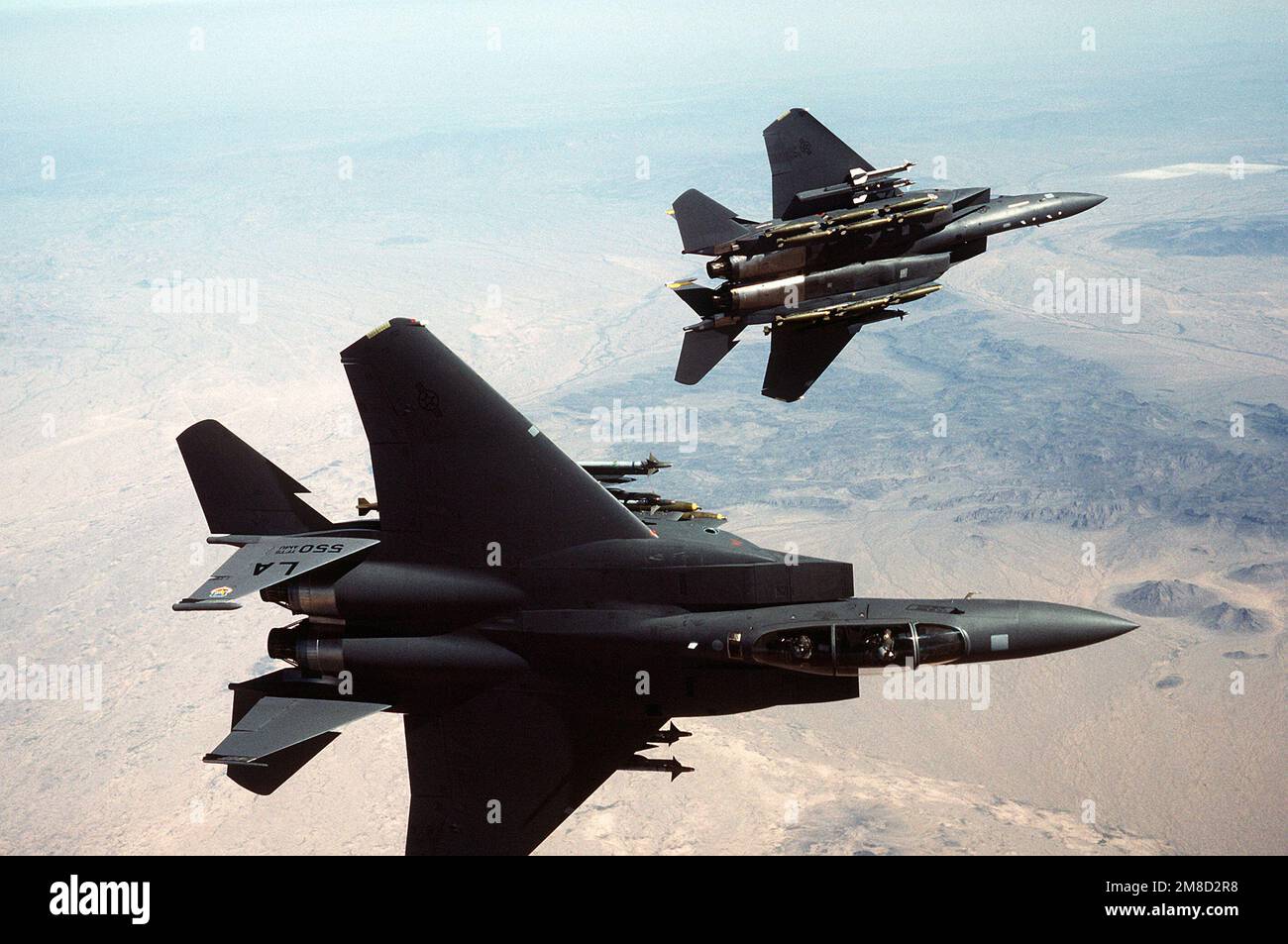 F-15 Eagle aircraft are put through maneuvers during a combat safety ...