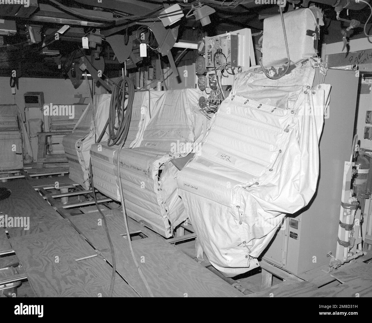 A view of the combat information center of the guided missile cruiser ...