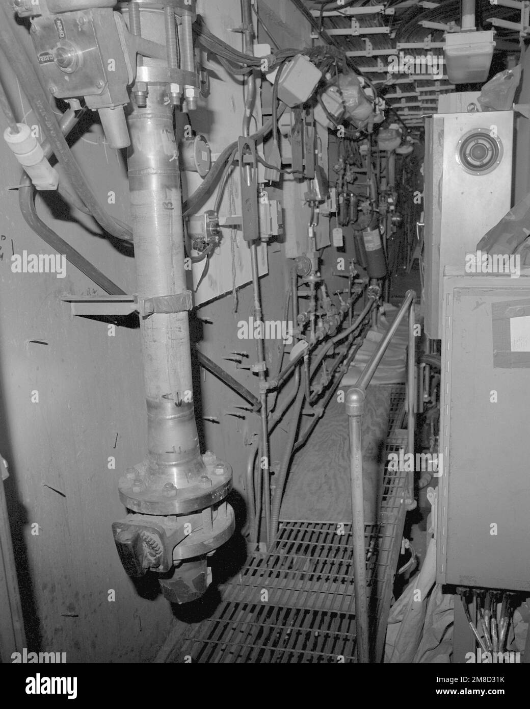 A view of the ship's service generator room No. 3 of the guided missile ...