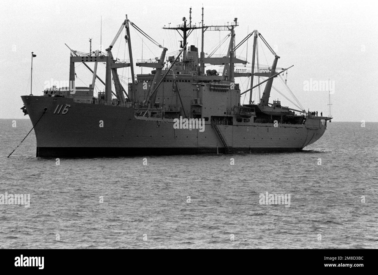 The amphibious cargo ship USS ST. LOUIS (LKA-116) lies at anchor in the ...