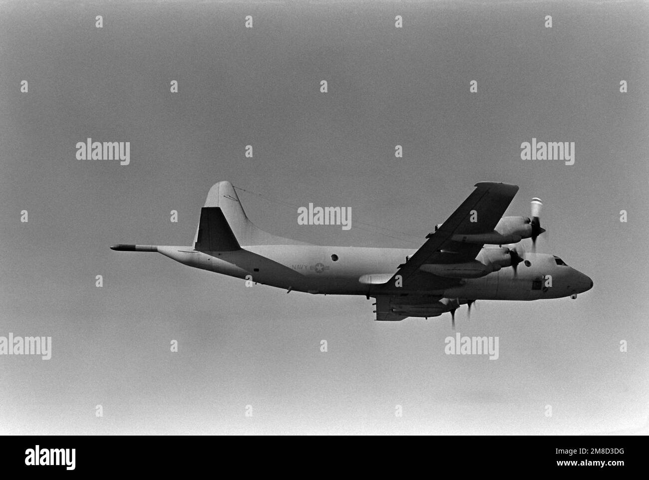 An air-to-air right side view of a Naval Air Reserve Patrol Squadron 66 ...