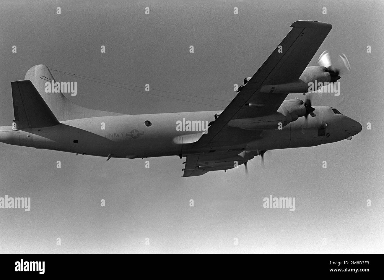 An air-to-air right side view of a Naval Air Reserve Patrol Squadron 66 ...