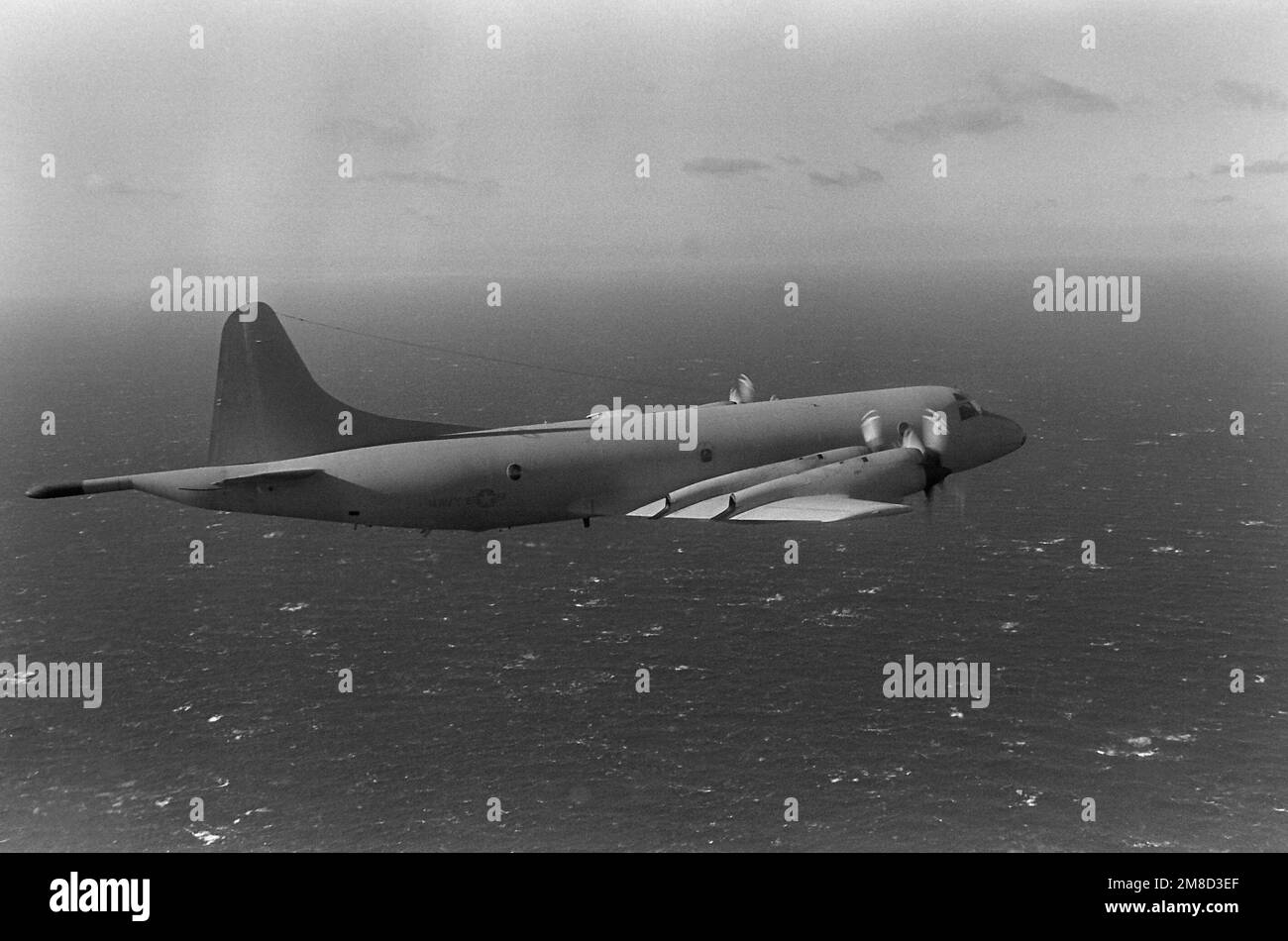An air-to-air right side view of a Naval Air Reserve Patrol Squadron 66 ...