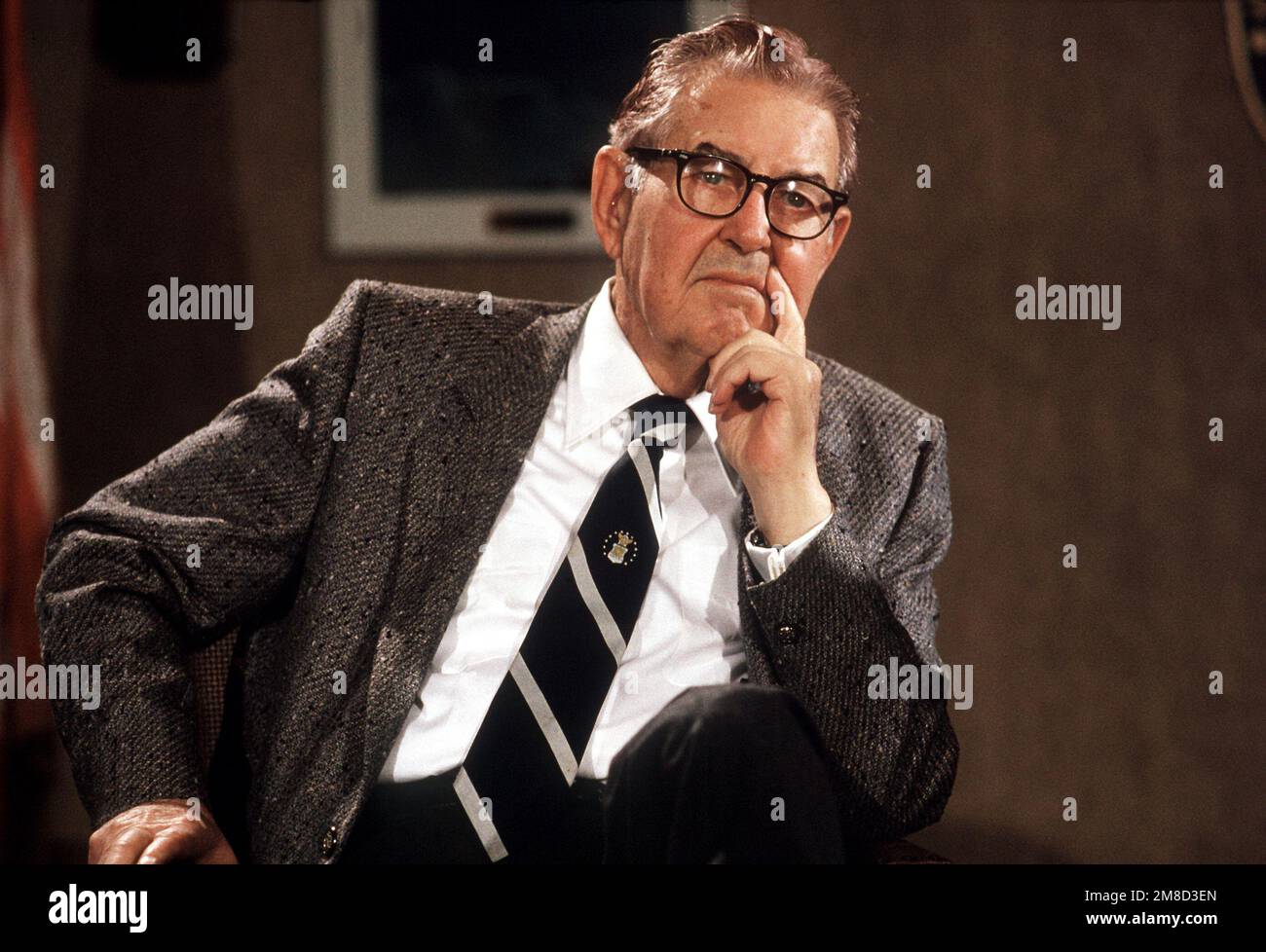 Retired GEN Curtis E. LeMay listens to a question during an interview ...