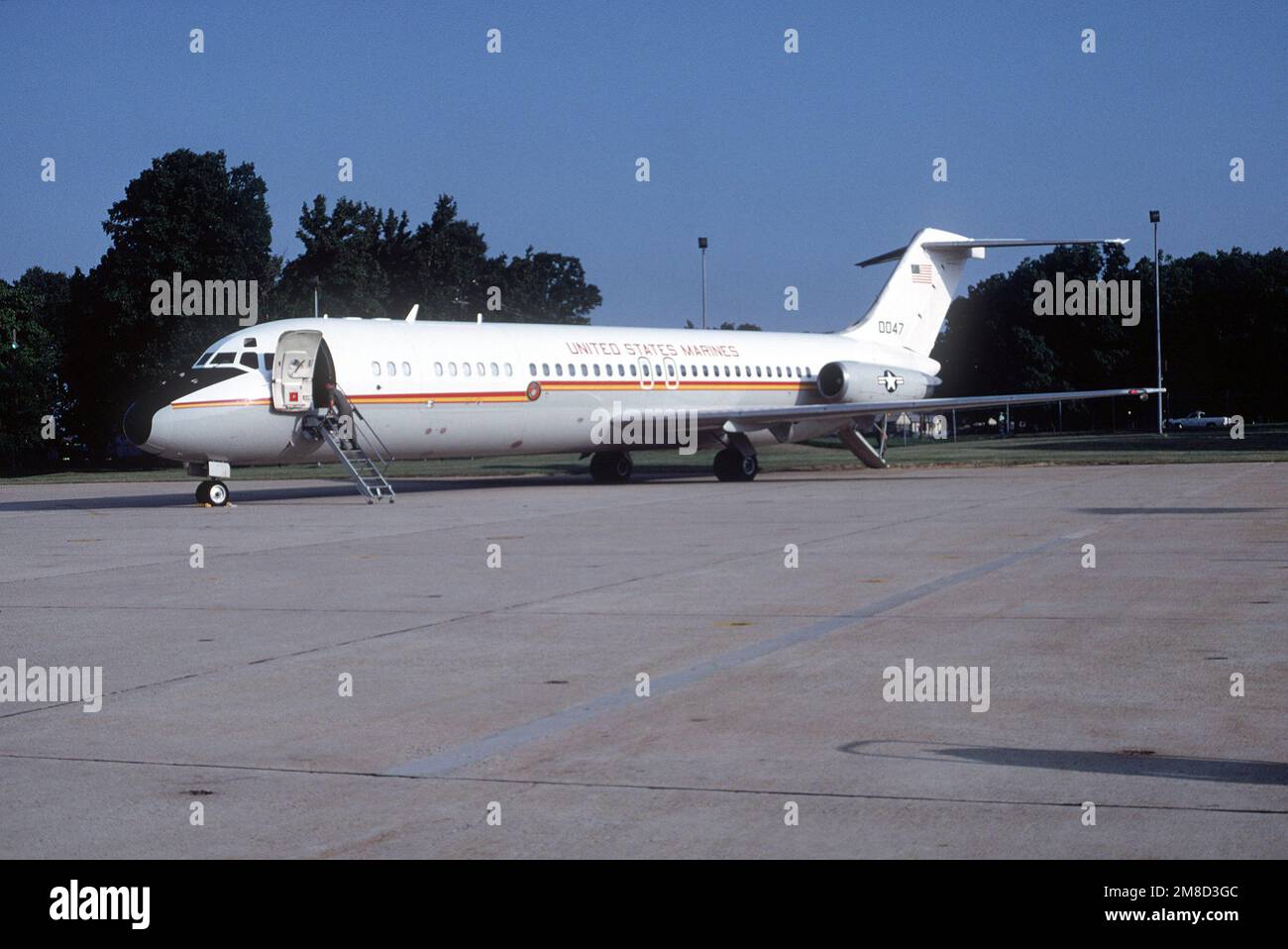 A left side view of a Marine C-9B Skytrain II aircraft parked on the ...