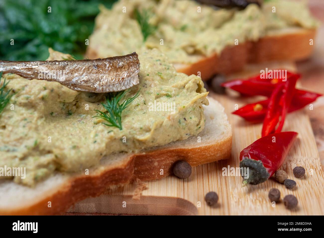 Sandwich with pate and sprats. Sprat pate with spinach and pepper ...