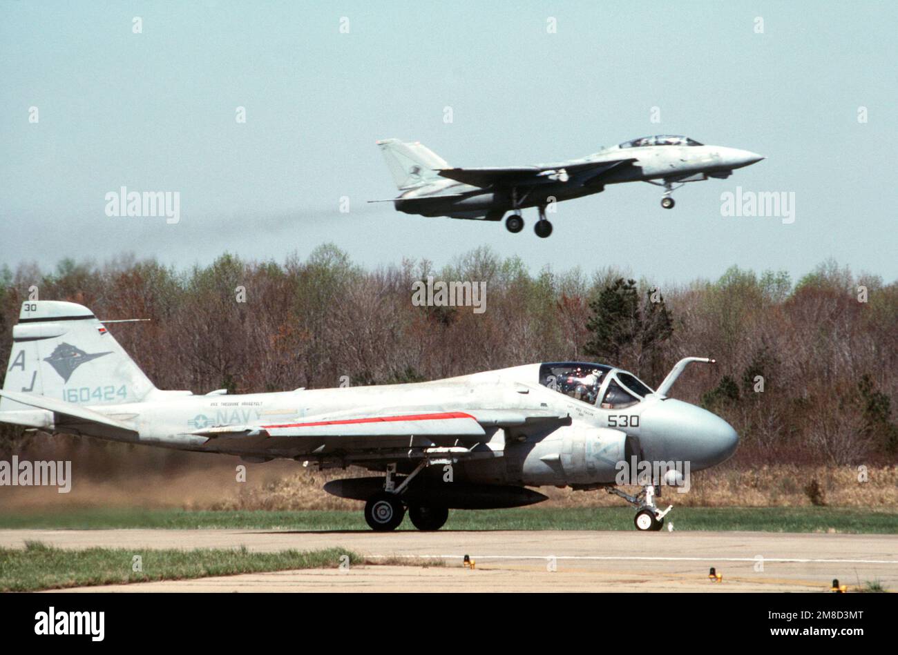 An Attack Squadron 36 (VA-36) A-6E Intruder aircraft rolls along a ...