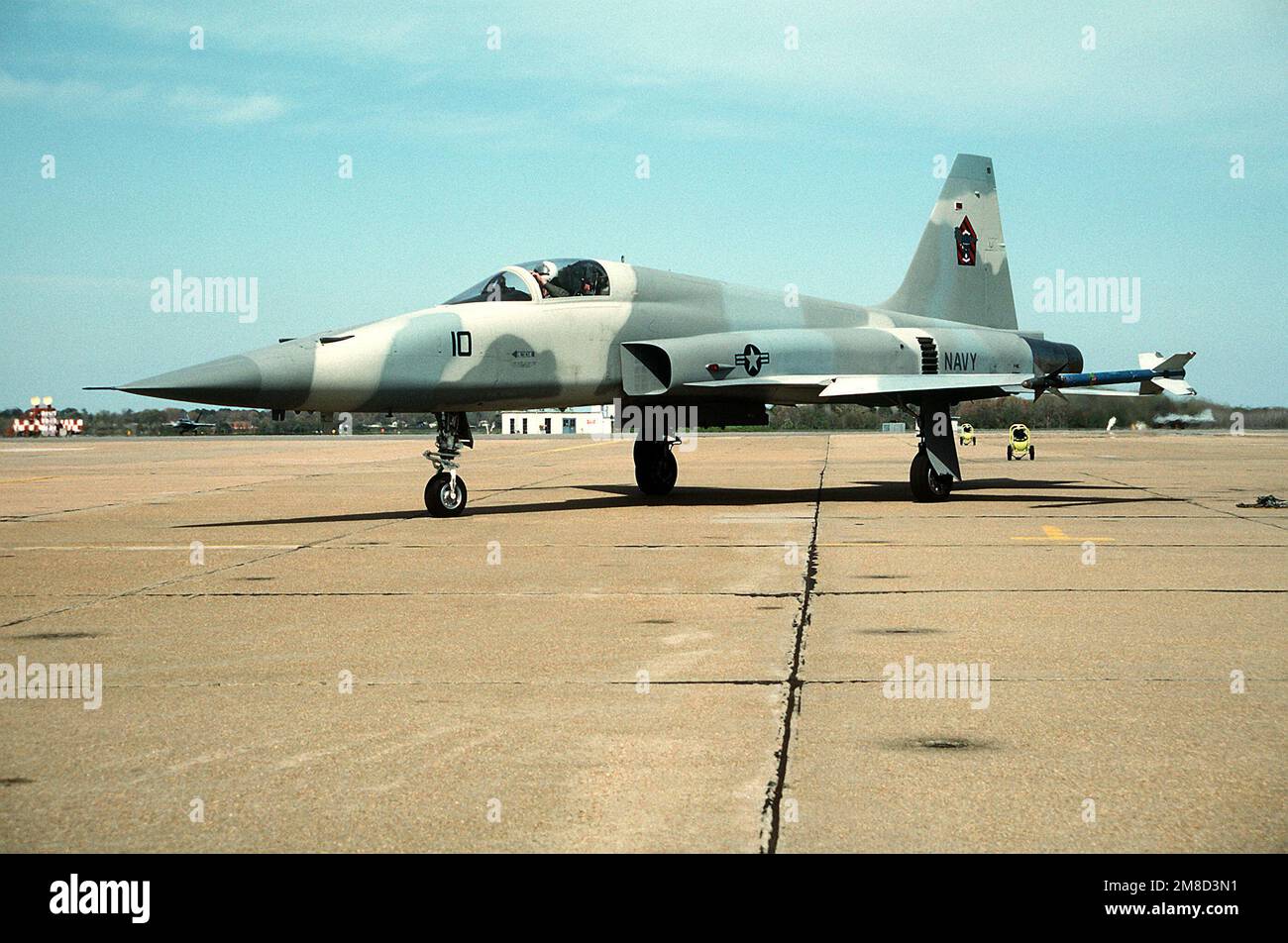 A left front view of a Fighter Squadron 43 (VF-43) F-5E Tiger II ...