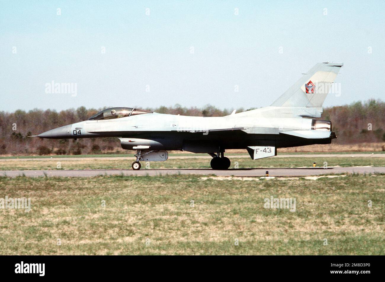 A left side view of a Fighter Squadron 43 (VF-43) F-16N Fighting Falcon ...