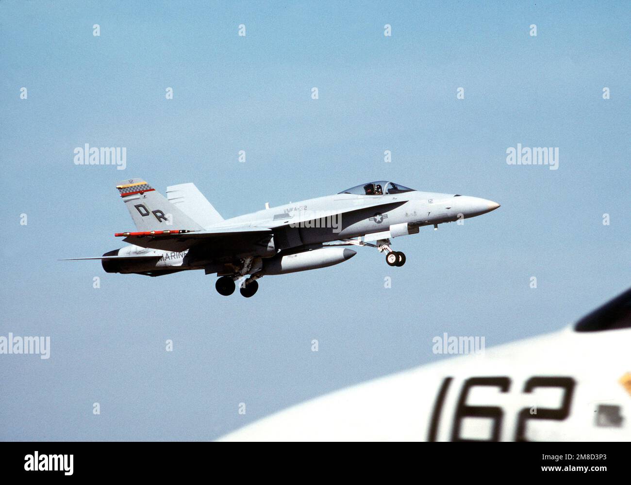 A Marine Fighter-Attack Squadron 312 (VMFA-312) F/A-18A Hornet aircraft ...